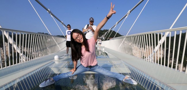 China Opens World's Record Breaking Highest And Longest Glass Bridge